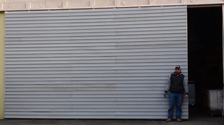 Giant Sliding Factory Door | Non-warping patented wooden pivot door ...